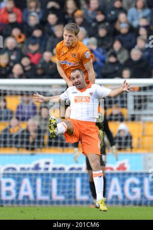 Christophe Berra of Wolverhampton Wanderers and Gary Taylor-Fletcher of ...