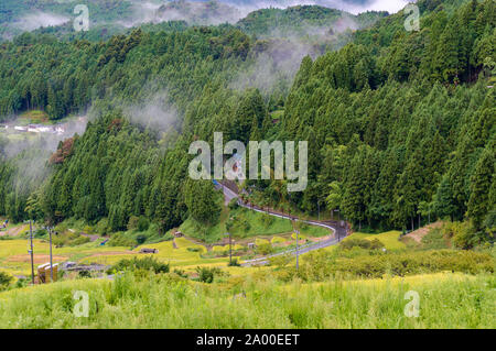 View on japanese countryside with highway bridge and forested hills on ...