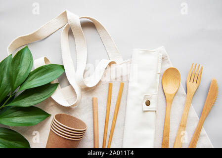 Cotton bag and recycled tableware top view. Zero waste, eco friendly ...