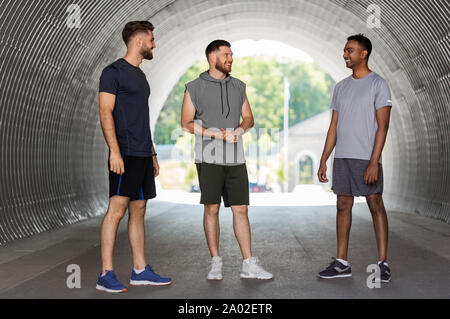 Young hispanic sporty man smiling happy having online sport class at ...