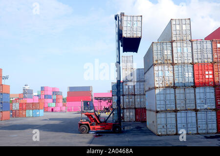 Container handlers in the boat Stock Photo - Alamy