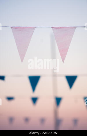 Triangle papers hanging on the rope.On the white background Stock Photo ...