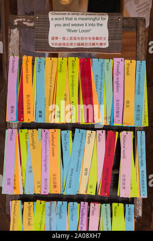 Canada word on a paper card, isolated word with blurred background ...