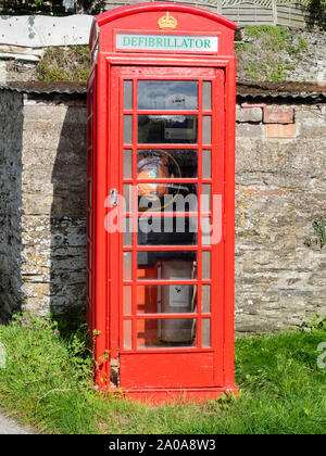 Iconic obsolete BT red phone box repurposed to house a defibrillator in ...