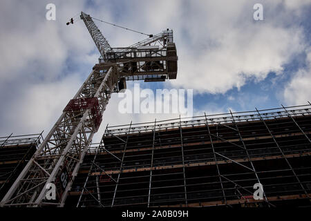 Steel scaffolding on cloudy sky Stock Photo - Alamy