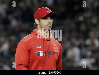 New York Yankees Brad Ausmus stands on the field before a spring ...