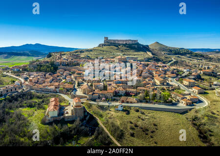 Aerial view of Atienza medieval town and castle in Spain with blue sky ...