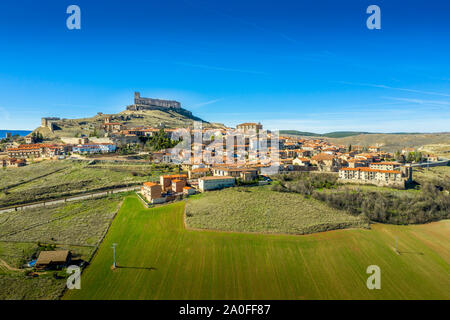 Aerial view of Atienza medieval town and castle in Spain with blue sky ...