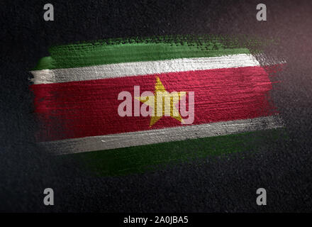 Suriname flag on abstract stroke brush background Stock Photo - Alamy