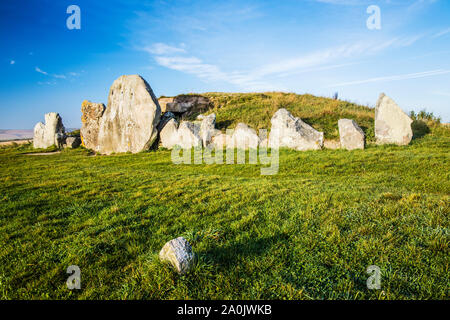 West Kennet long barrow, Wiltshire, UK at night with the milky way ...