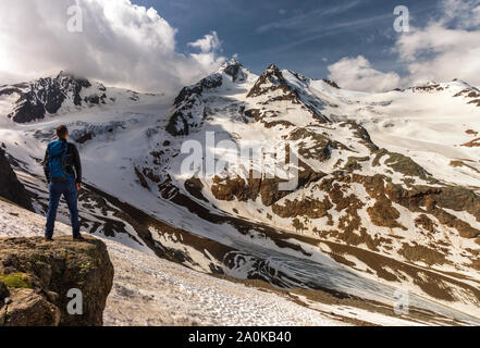 Hiker at the edge of glacier in south tyrol Stock Photo - Alamy