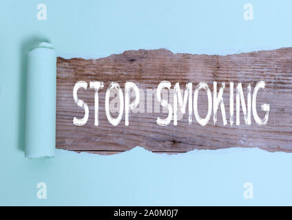 Text sign showing Stop Smoking. Business photo text the process of ...