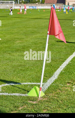 Children play flag football on a mini flag football field, set up in ...