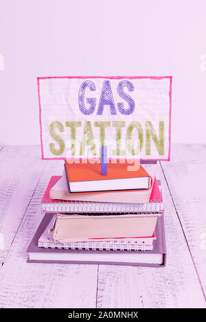 Books with gasoline pump nozzle refueling of human brain. Books as fuel ...