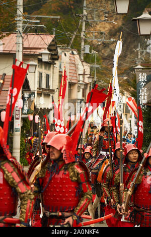 Japanese reenactors dressed in red traditional samurai costume and ...