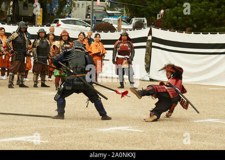 samurai in traditional armor fighting with katana swords Stock Photo ...