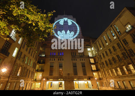 London, UK. 21st September 2019. Batman Bat signal projected on Senate ...