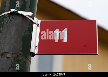 Red number 11 (number eleven) with golden symbols endless knot. 3D ...