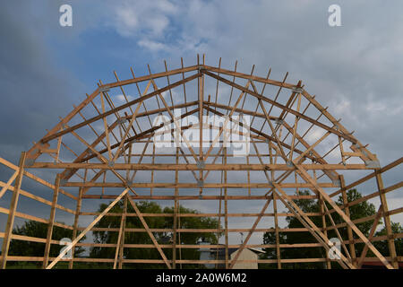 Barn under construction framed and partially complete on a farm in a ...