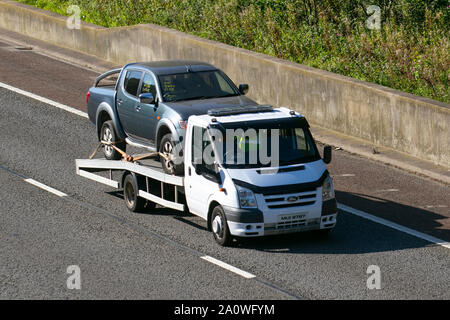 A Ford Cargo recovery truck Stock Photo - Alamy