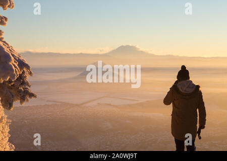 Male photographer on the mountain top. Winter, dark, night, snow Stock ...