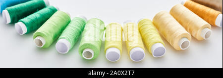 panoramic shot of colorful and bright threads on white background Stock ...