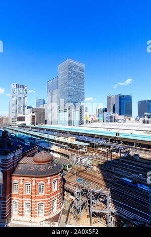 Tokyo Tower behind high-rise apartment buildings in Tokyo, Japan Stock ...