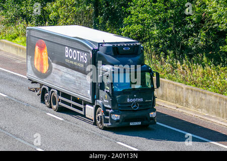 Booths supermarket Delivery. food truck van approaching depot in ...