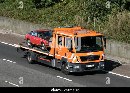 A MAN RAC flatbed vehicle breakdown recovery truck Stock Photo - Alamy