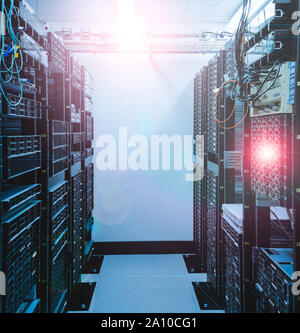 Server rack cluster in a data center (shallow DOF; color toned image ...