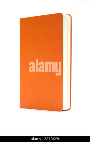 Orange diary isolated on white background Stock Photo - Alamy