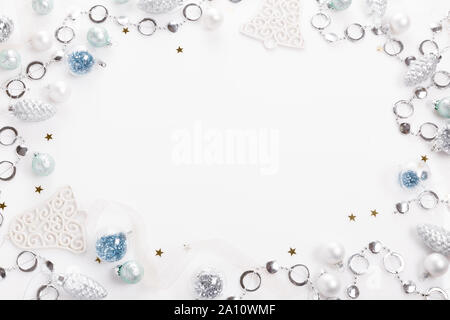 Silver pine cone decorations on dark stone background for a Christmas ...