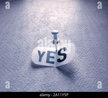 Close up of a Yes tag on paper Stock Photo - Alamy