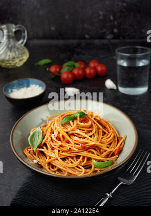 A vertical closeup shot of a plate full of Vietnamese food at a ...