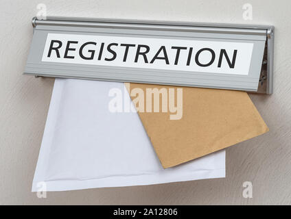 A letterbox with the label Registration Stock Photo - Alamy