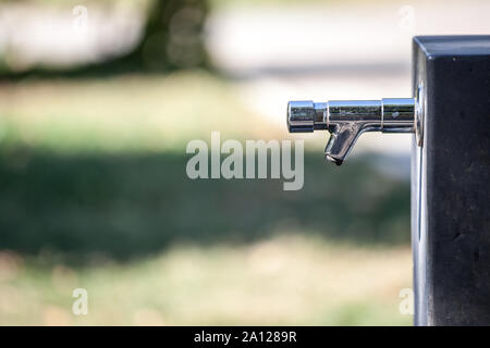 Public drinking water tap on street Stock Photo - Alamy
