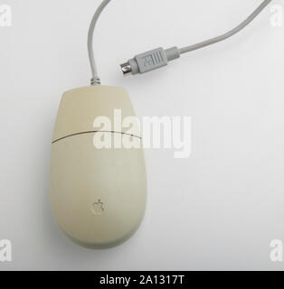 A digital illustration of a computer keyboard with a mouse clicking ...