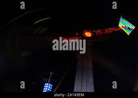 Light trail sweeps drawn by mechanical arm in motion mechanical games ...