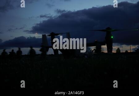 A CV-22 Osprey vertical lift aircraft hangs in the anechoic chamber at ...