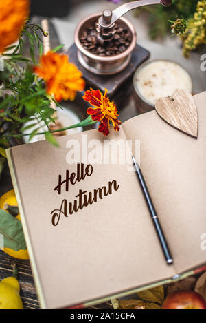 Blank brown notebook with autumn flowers Stock Photo - Alamy