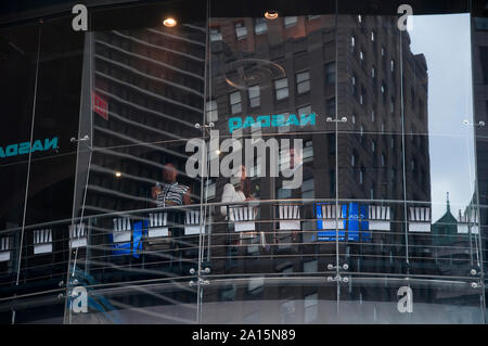 NASDAQ building in Time Square at night Stock Photo - Alamy