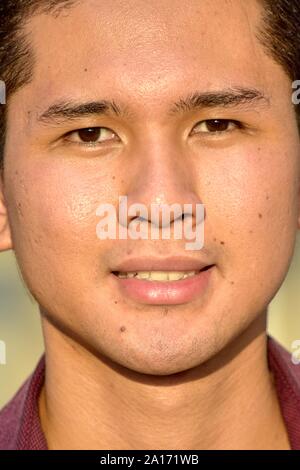 A Young Filipino Male Smiling Stock Photo - Alamy