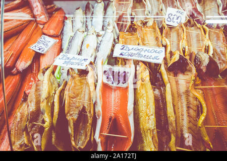 Dried fish Omul lying on the counter in Listvyanka, Lake Baikal ...