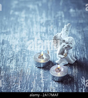 shabby chic wooden christmas angel on a wooden table Stock Photo - Alamy