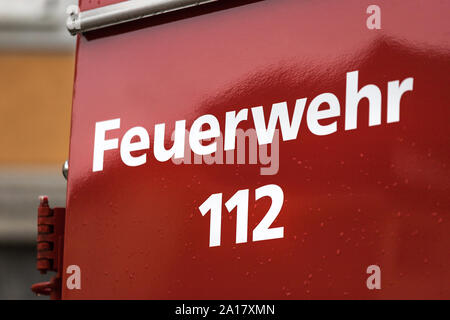 Sign, "Feuerwehr 112", German for "fire service 112", emergency ...