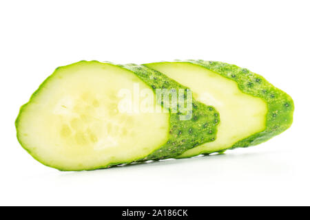 Two fresh cut cucumber slices isolated on white background, close up ...