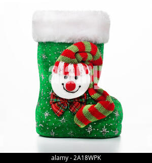 St. Nicholas Day. Red boot with sweets, spicy ginger cookies and gifts ...