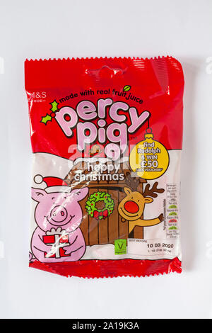 Bag of M&S Percy Pig Festive Helpers sweets made with real fruit juice opened with contents ...