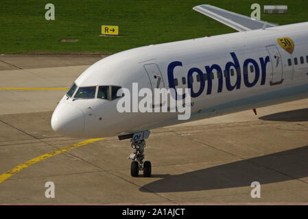 A close up Nose of the Boeing 757 with Pilots at the controls at ...