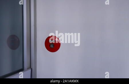 Closeup manual push station of fire alarm system, installing on the ...